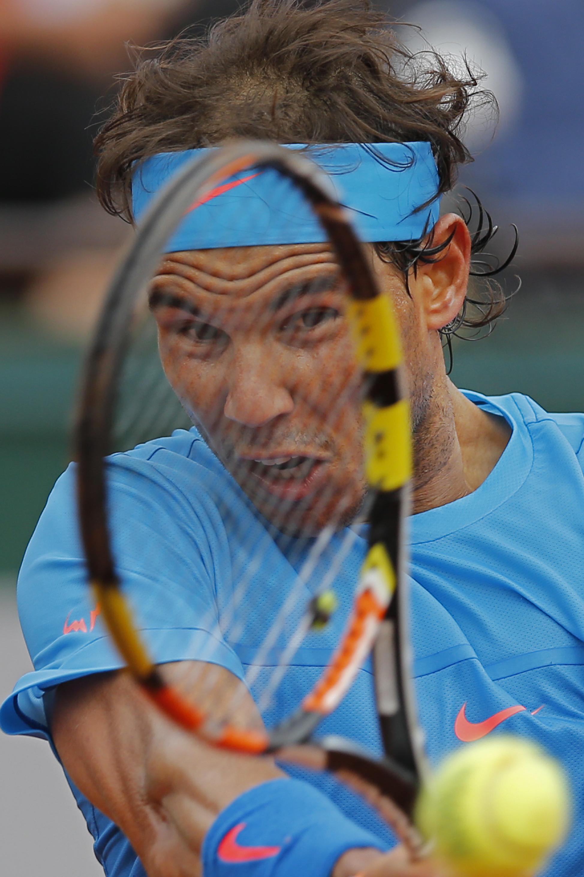 PHOTOS: Rafael Nadal eases past Nicolas Almagro in French Open second ...