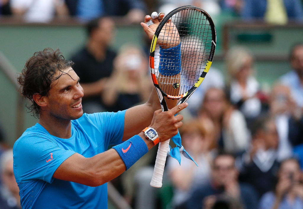 PHOTOS: Rafael Nadal eases past Nicolas Almagro in French Open second ...